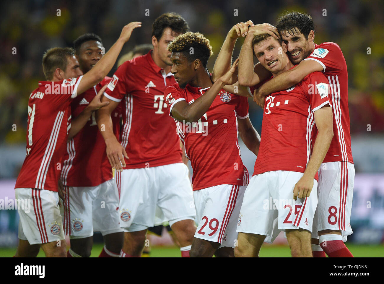 Dortmund, Germany. 14th Aug, 2016. Bayern's Philipp Lahm (l-r), David ...