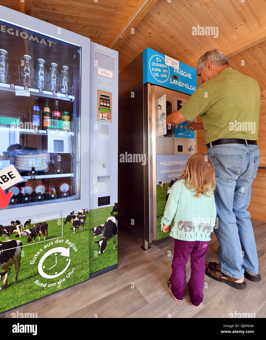 Oberwellenborn, Germany. 2nd Aug, 2016. Clients using a milk station in ...