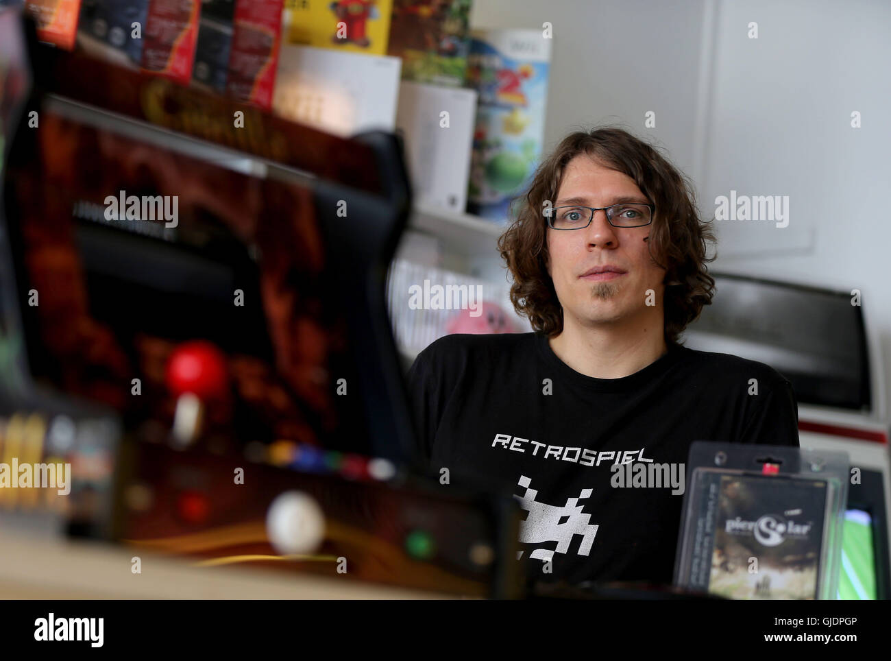 Cologne, Germany. 5th Aug, 2016. Christoph Noll, owner of a store for ...