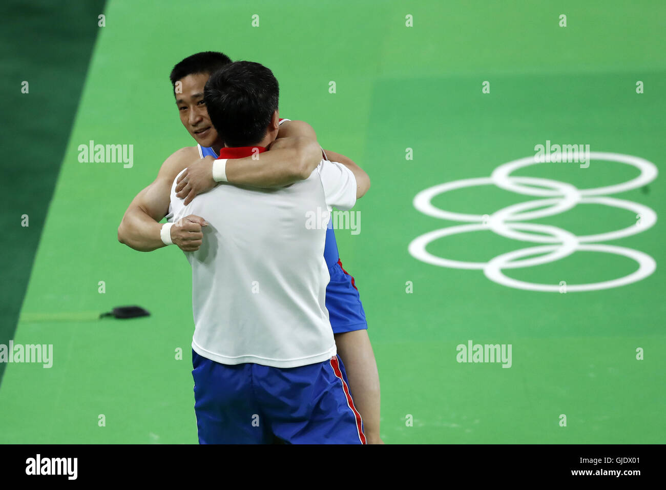 Rio De Janeiro, Brazil. 15th Aug, 2016. Ri Se Gwang (behind) of the ...