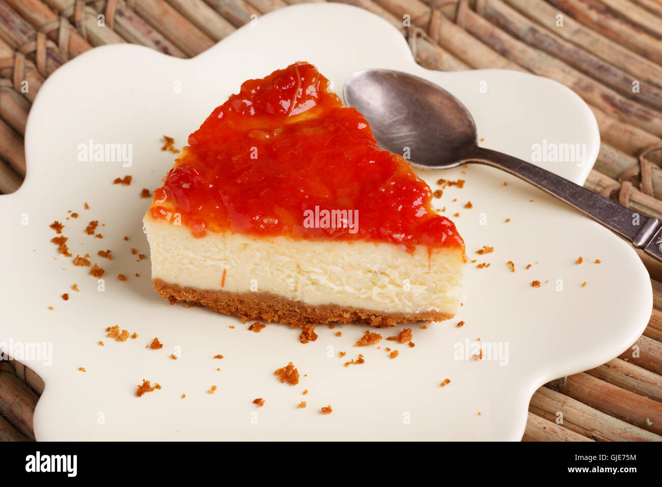 Cheesecake with brazilian goiabada jam of guava on plate on wooden ...