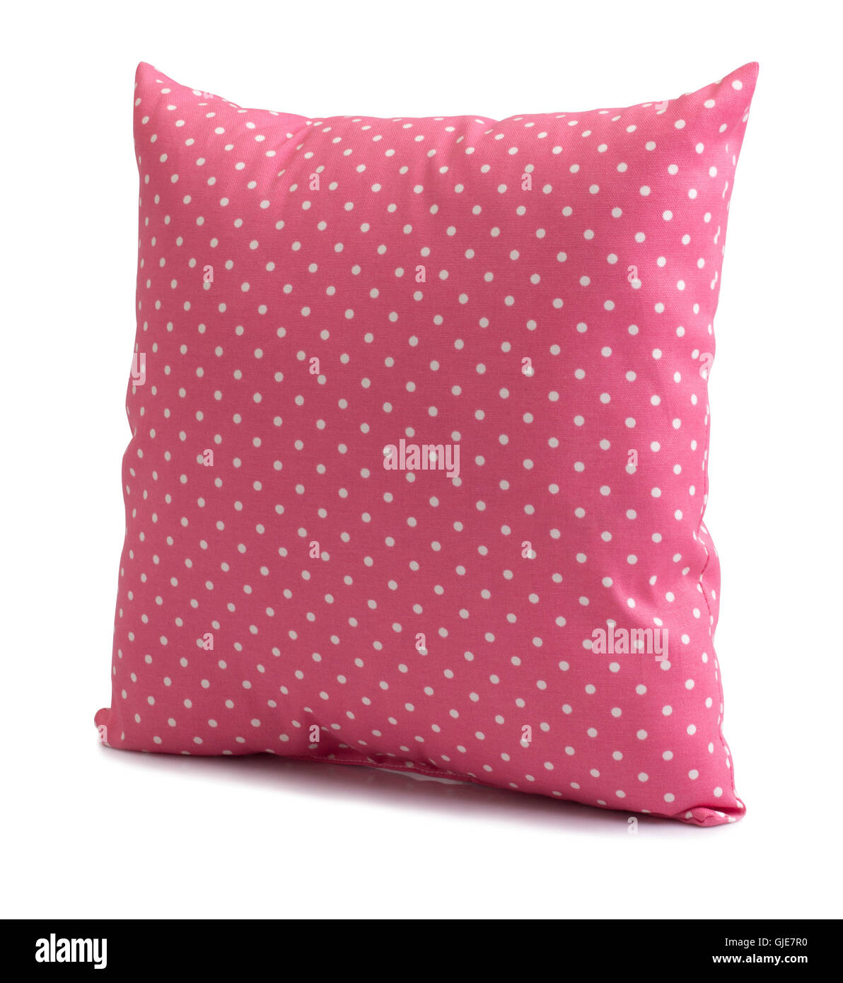 Polka dot pink cushion isolated on white background Stock Photo - Alamy