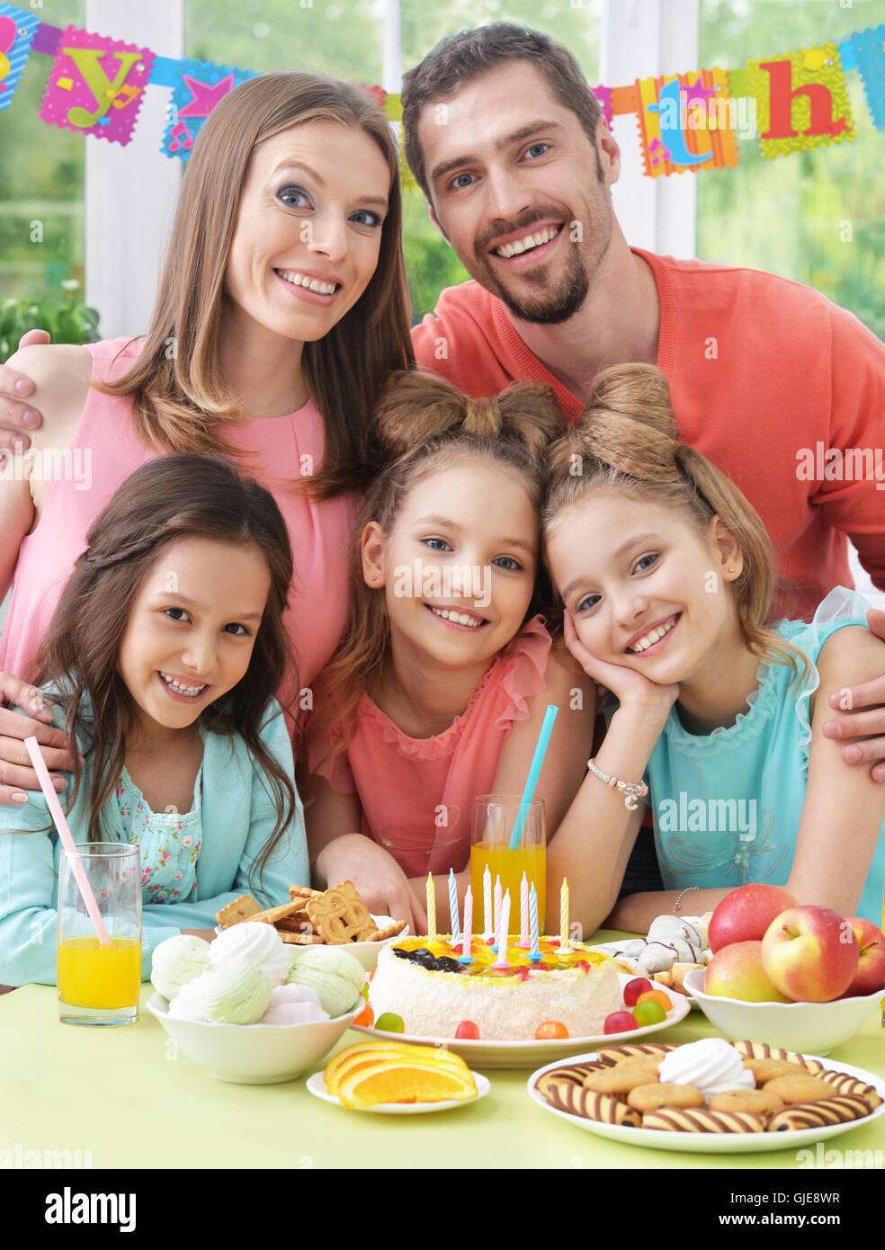 happy family with tasty food Stock Photo - Alamy