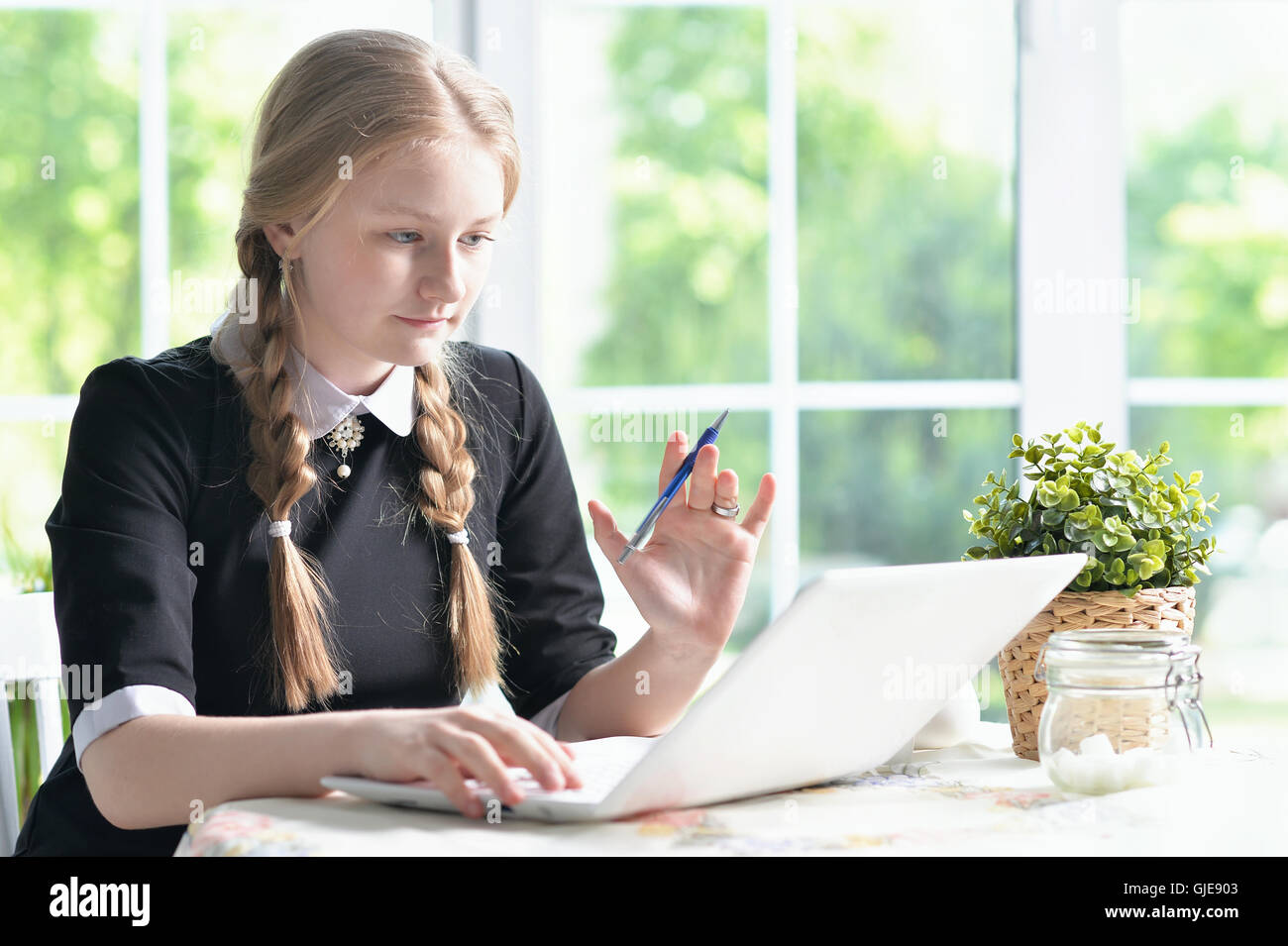 happy girl using laptop Stock Photo - Alamy