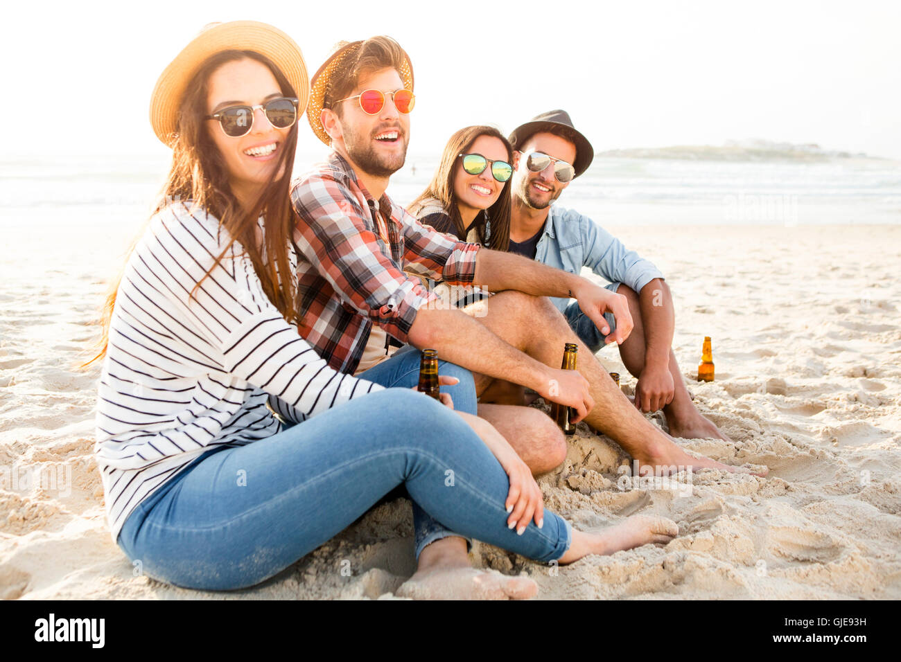 Friends at the beach enjoying the summer Stock Photo - Alamy