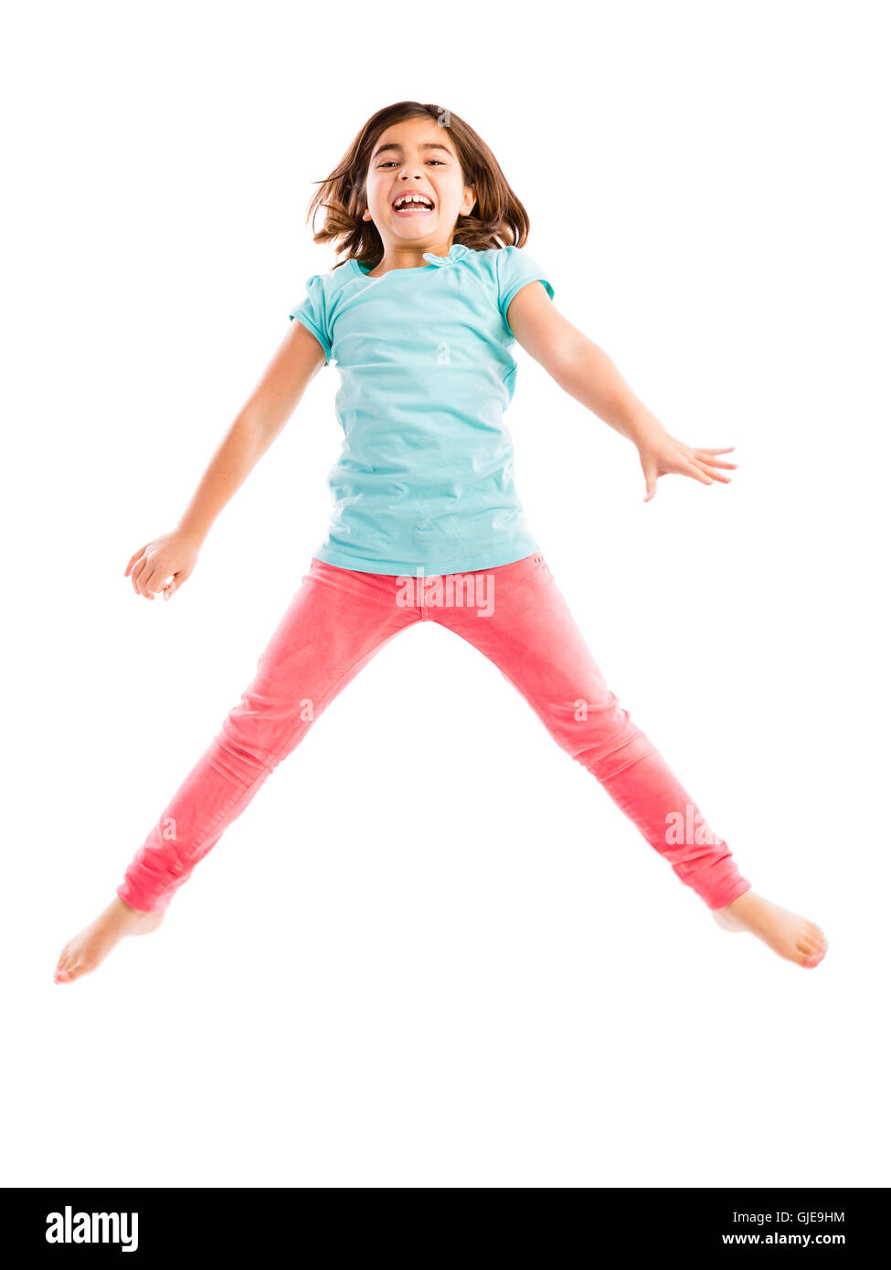 Young little girl jumping joy hi-res stock photography and images - Alamy