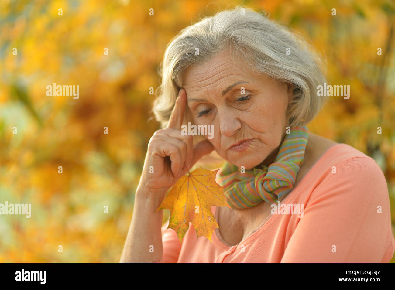 Nice sad old woman Stock Photo - Alamy