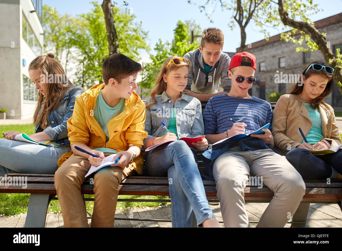 group of students with notebooks at school yard Stock Photo - Alamy