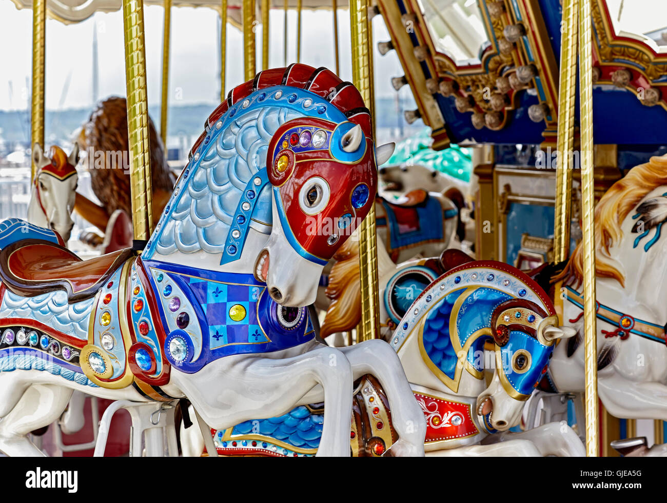 Carousel Horse on Brass pole on Merry Go Round with shallow depth of ...