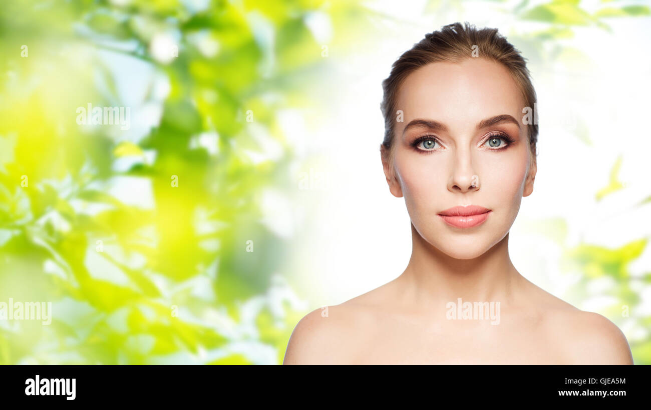 beautiful young woman face over white background Stock Photo - Alamy