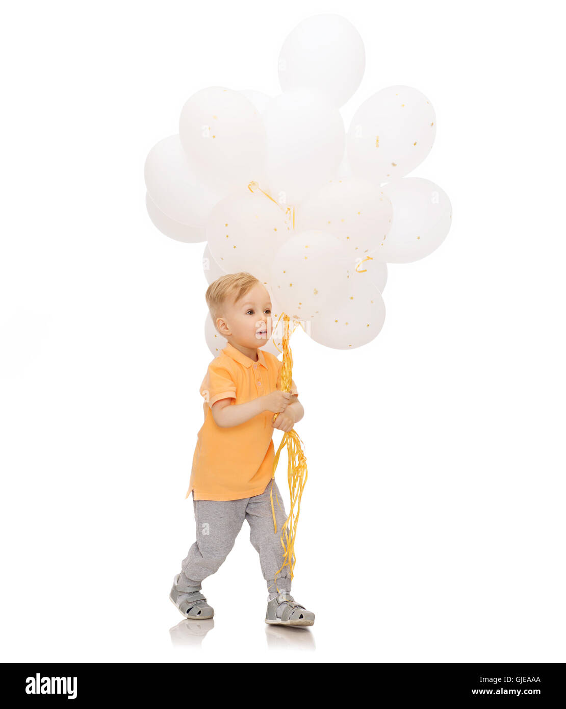 happy little baby boy with bunch of balloons Stock Photo - Alamy