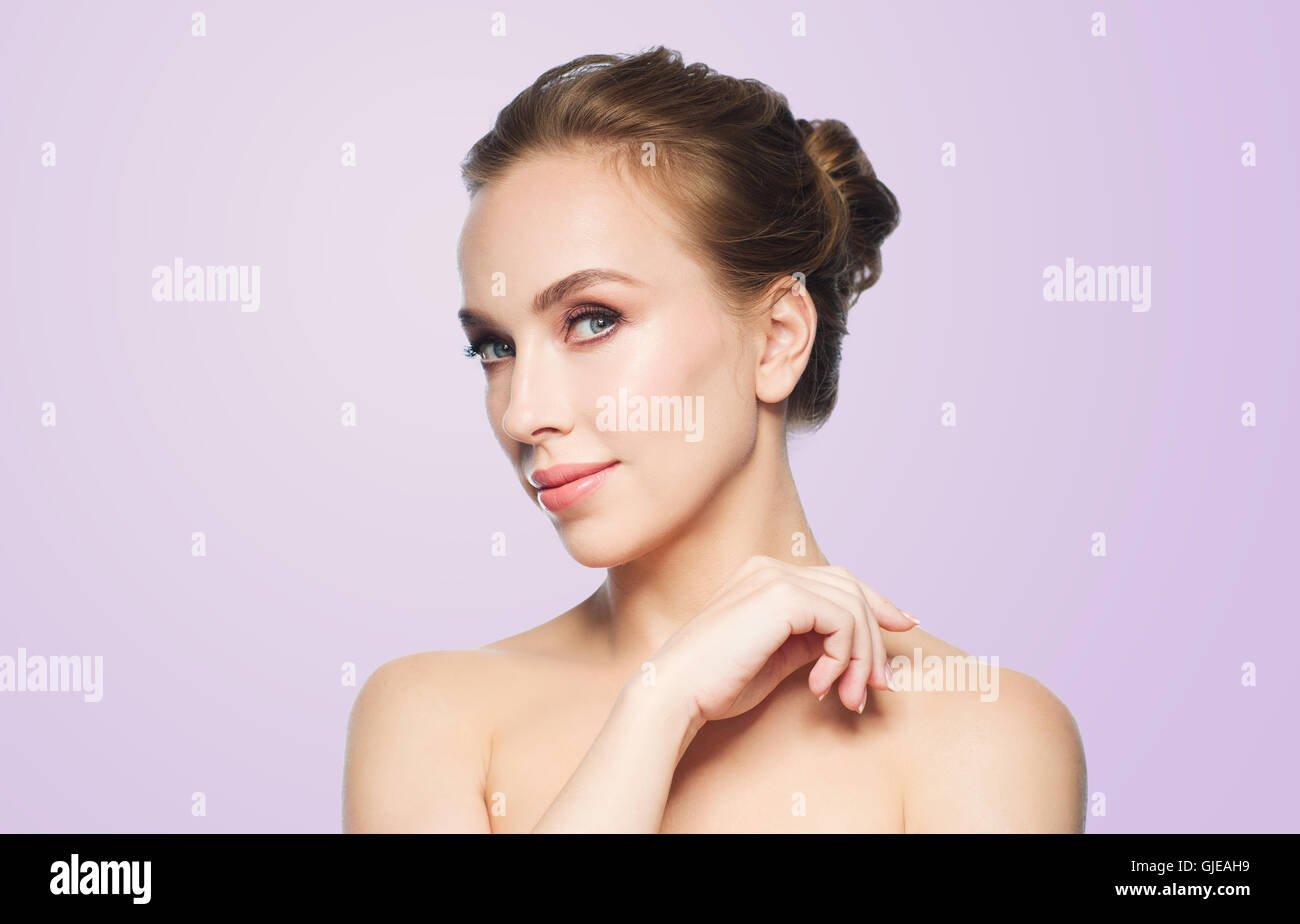 beautiful young woman face over white background Stock Photo - Alamy