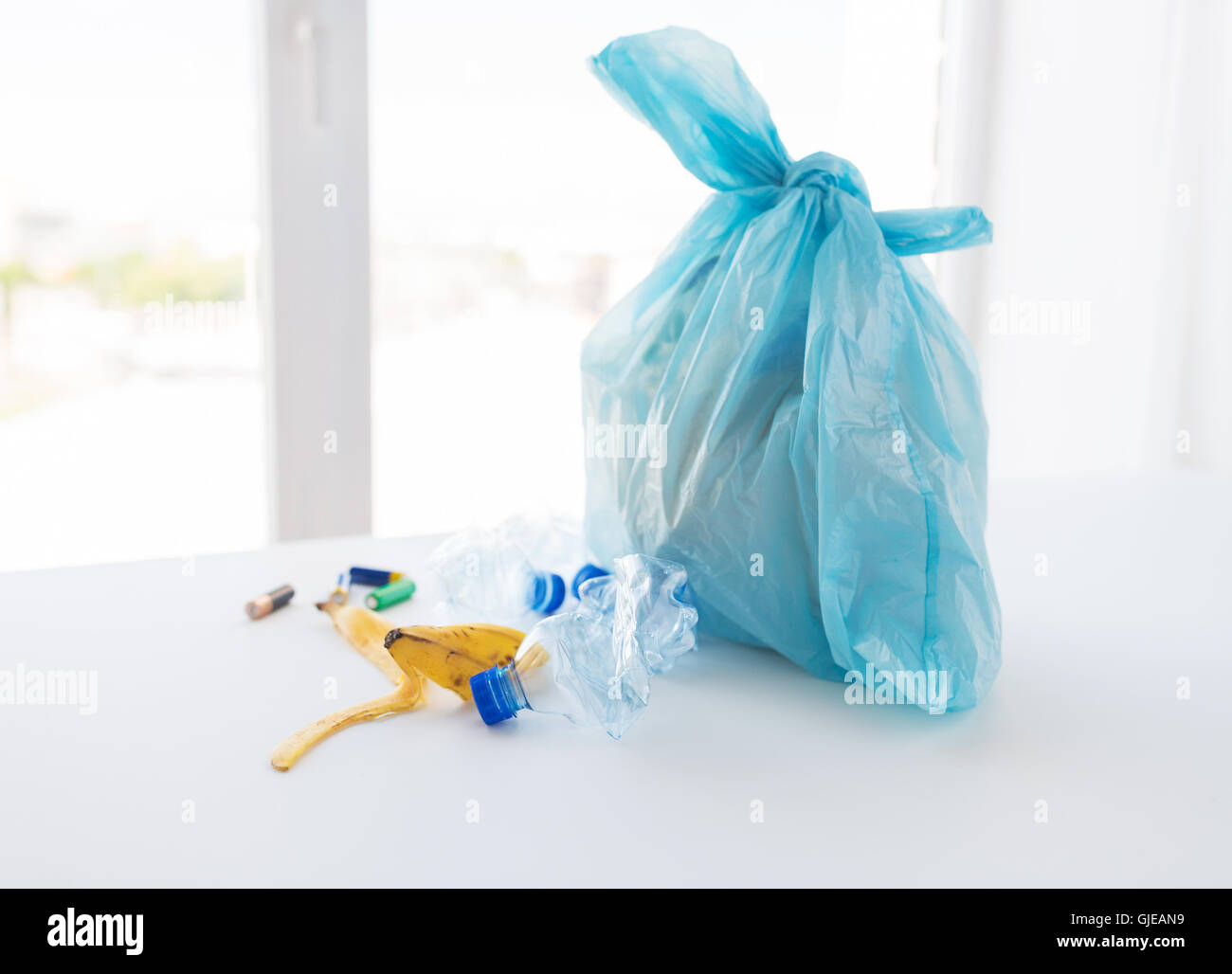 close up of rubbish bag with trash at home Stock Photo - Alamy