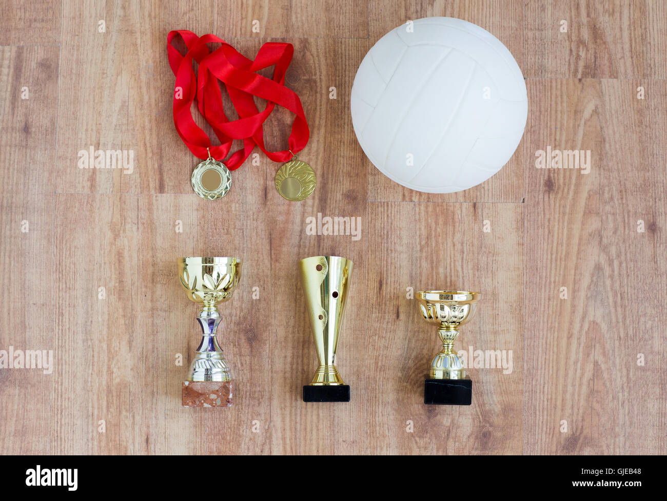close up of volleyball ball, cups and medals Stock Photo - Alamy