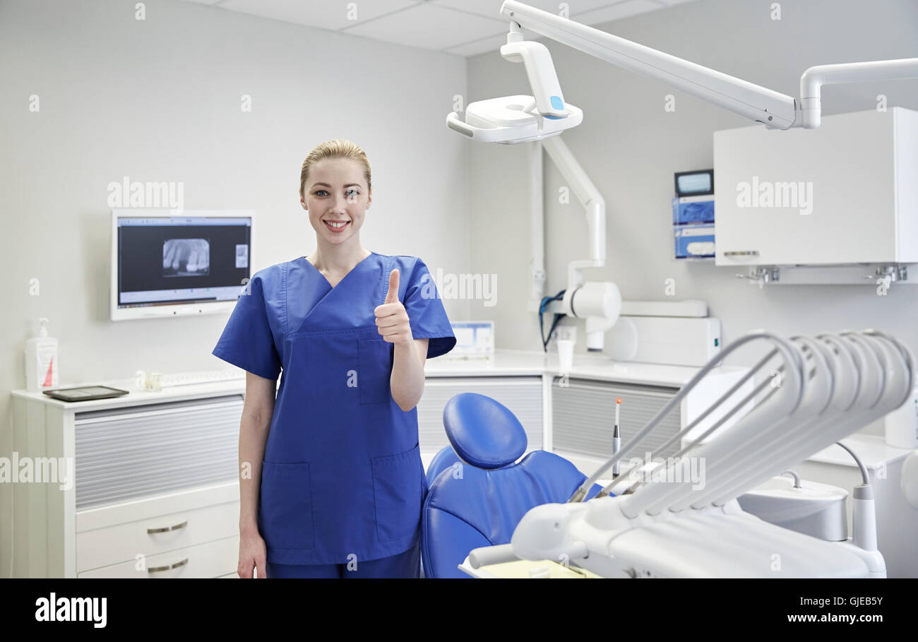 Dental dentist showing thumbs up hi-res stock photography and images ...
