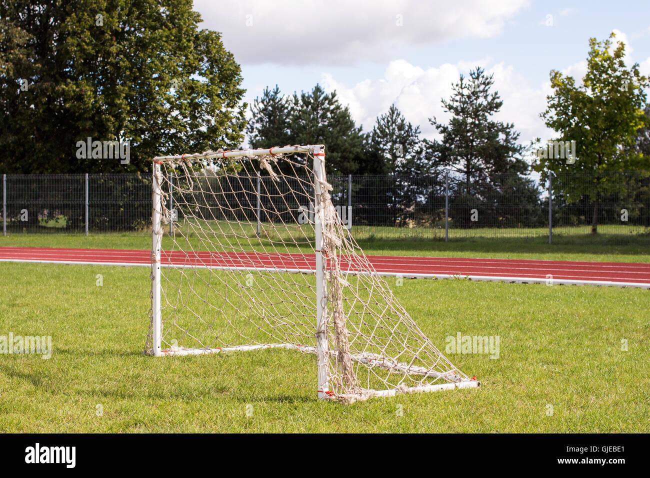 Small soccer gates for training on green field Stock Photo - Alamy