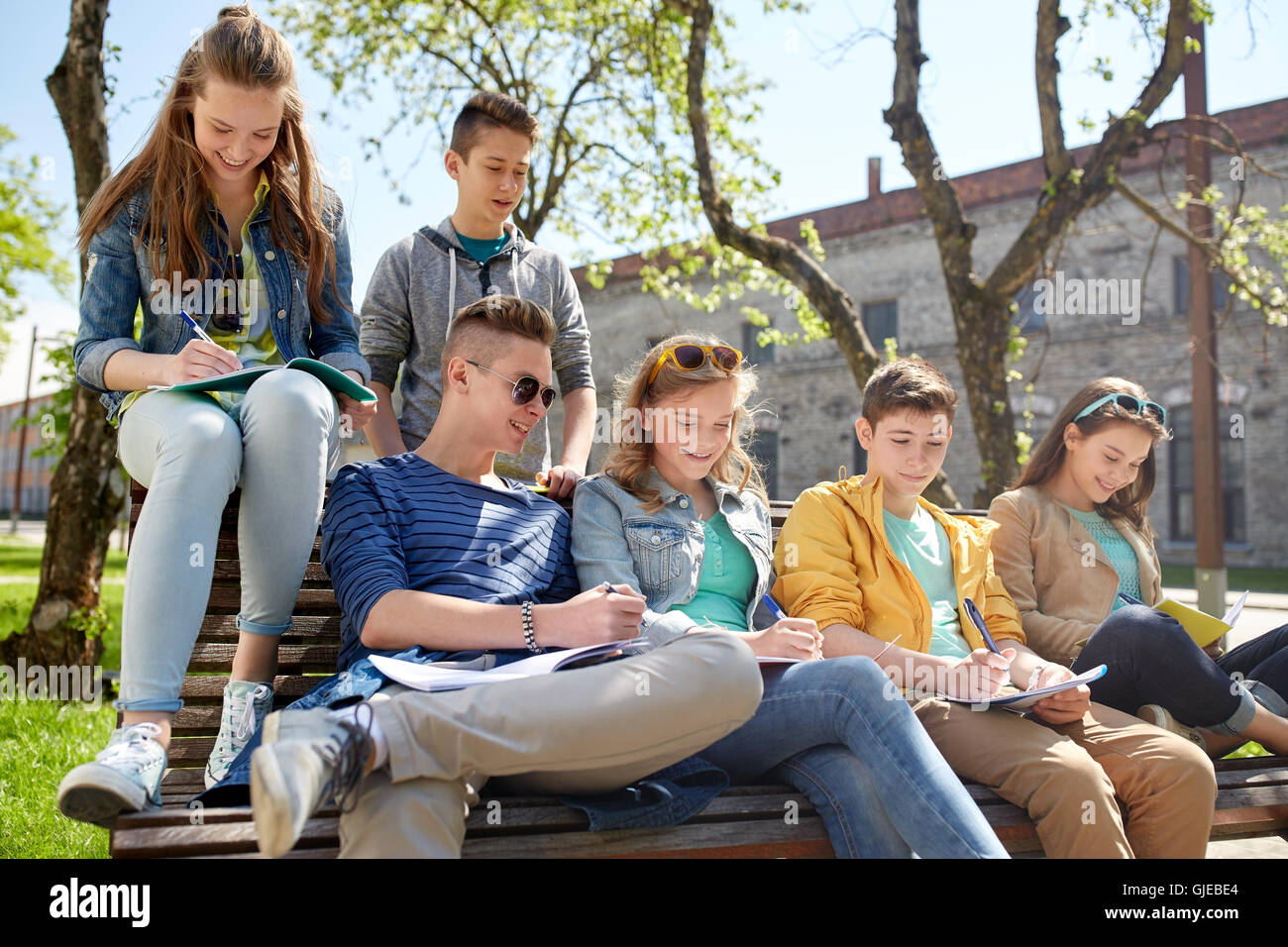 group of students with notebooks at school yard Stock Photo - Alamy
