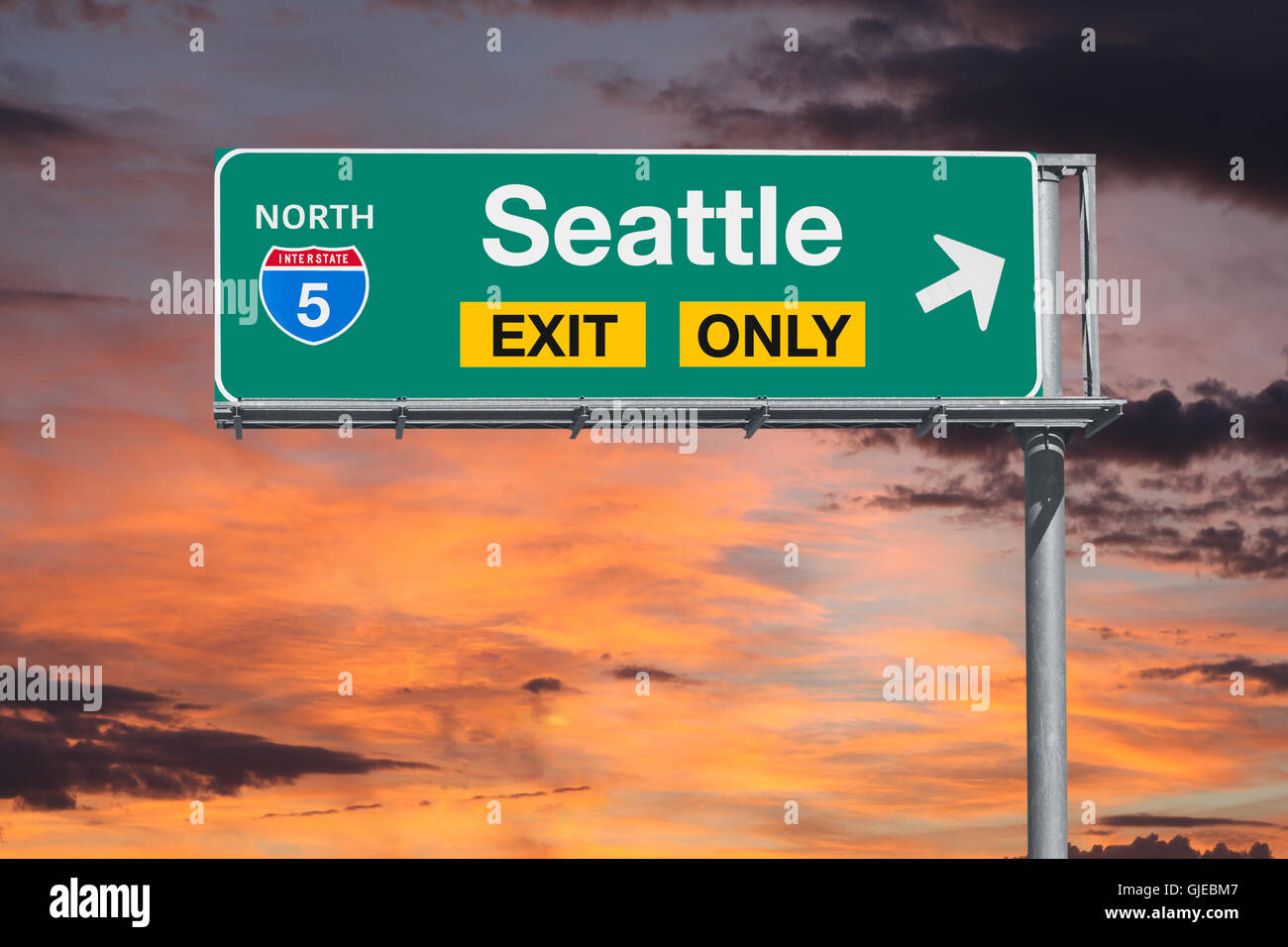 Seattle exit only 5 freeway sign with sunrise sky Stock Photo - Alamy