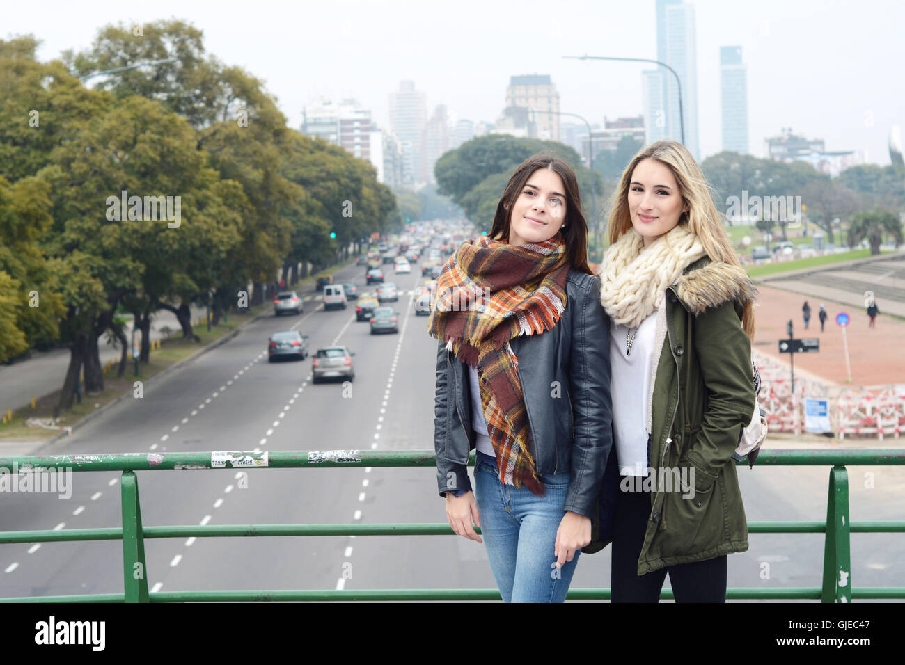 Portrait of two beautiful young woman. Urban concept. Outdoors Stock ...