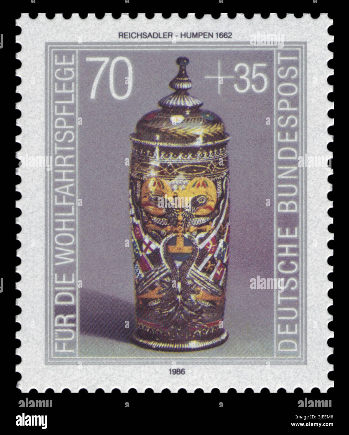 The 1986 DBP 1297 stamp features the Reichsadlerhumpen, a traditional ...