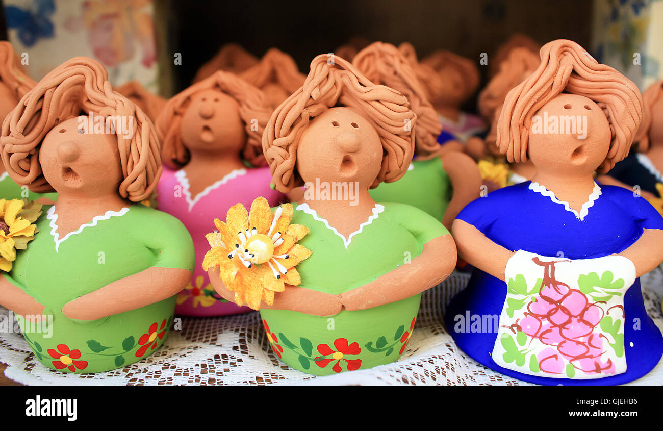 Terracotta colored dolls Stock Photo - Alamy