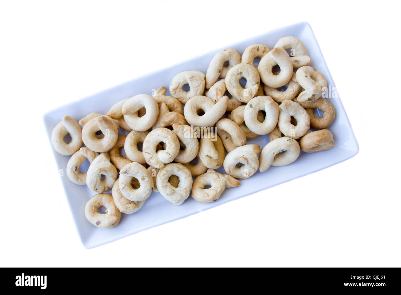 Bagels on a ceramic tray on a white background seen from above Stock ...