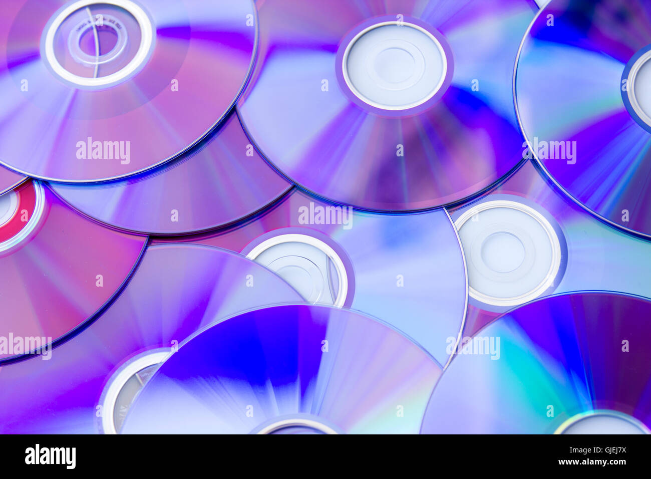 Many Compact Discs scattered seen from above Stock Photo - Alamy