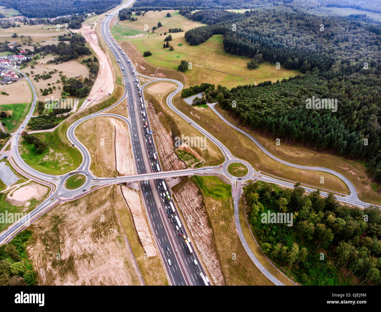 Aerial view of highway junction, green forest, Netherlands Stock Photo ...