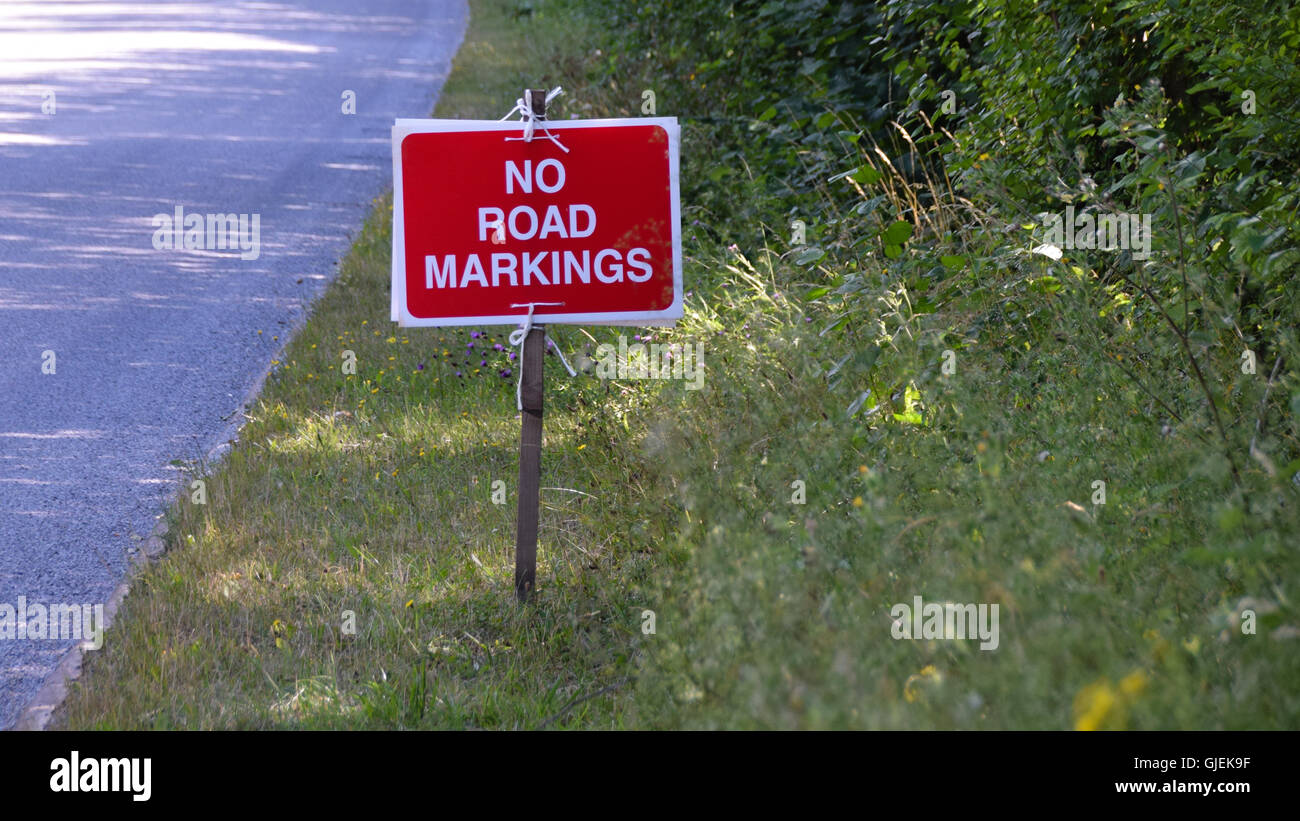 No road markings sign by the side of newly graveled road Stock Photo ...