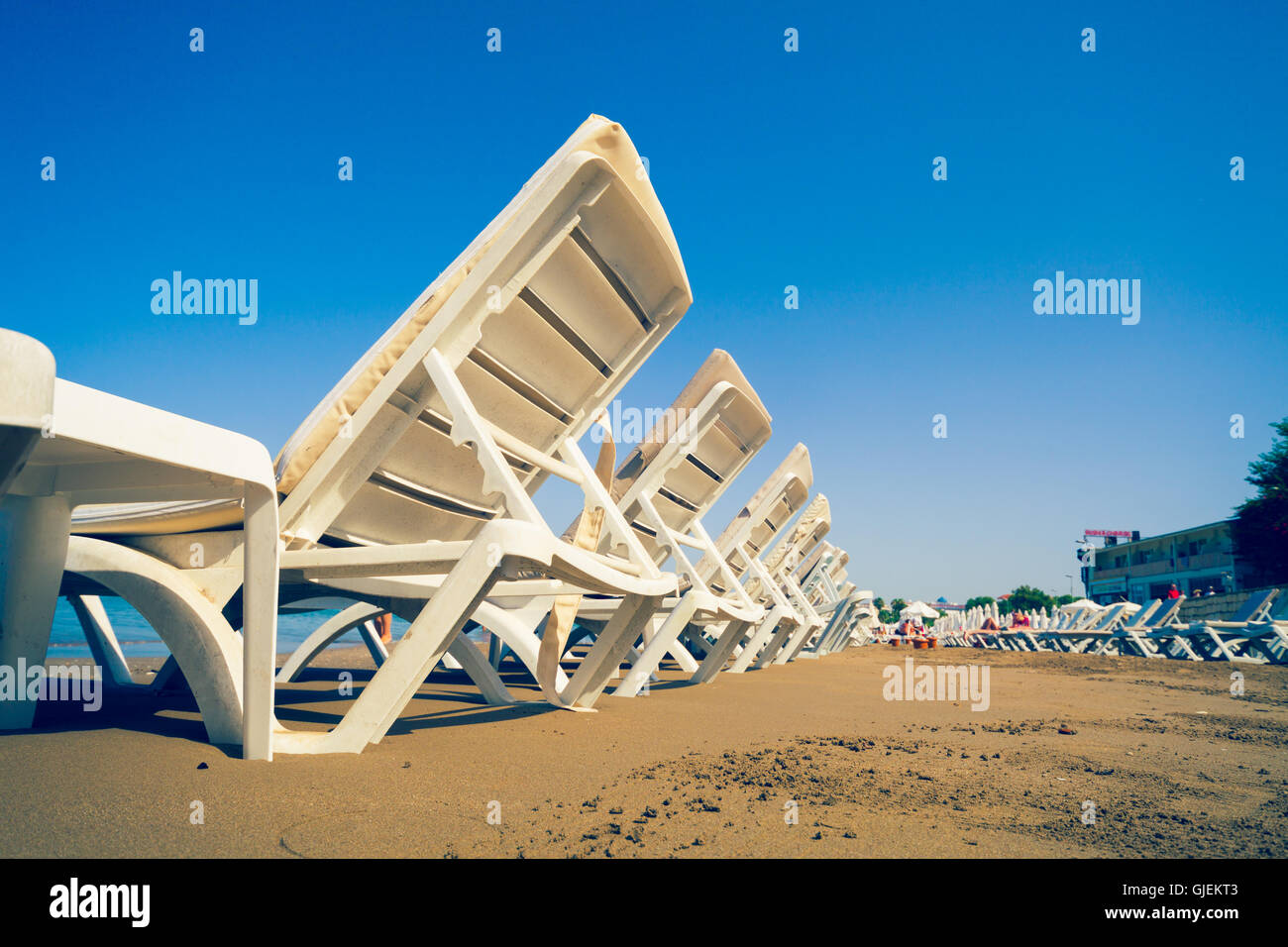 Sunbed on the beach. Toned image Stock Photo - Alamy