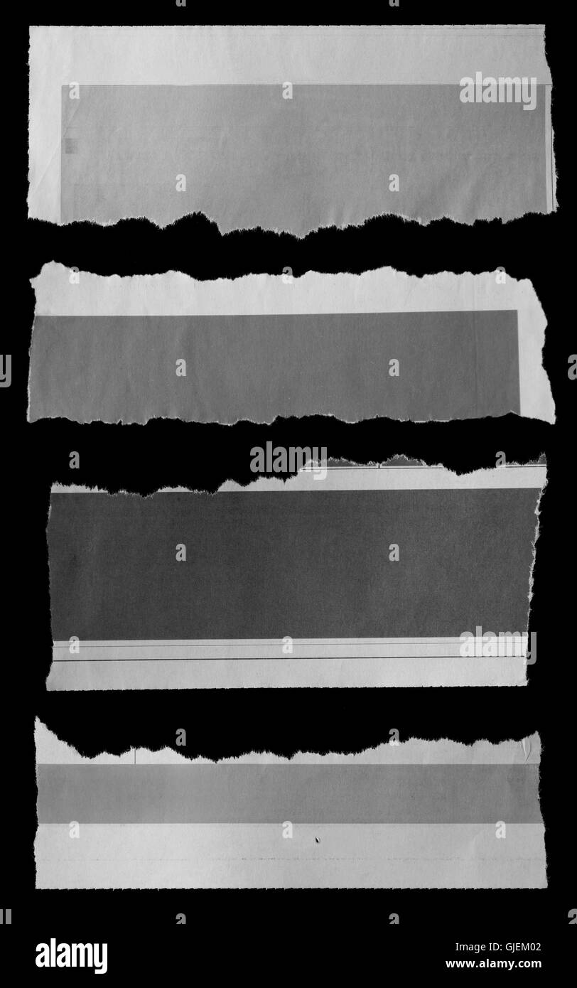 Pieces of torn paper on black Stock Photo - Alamy