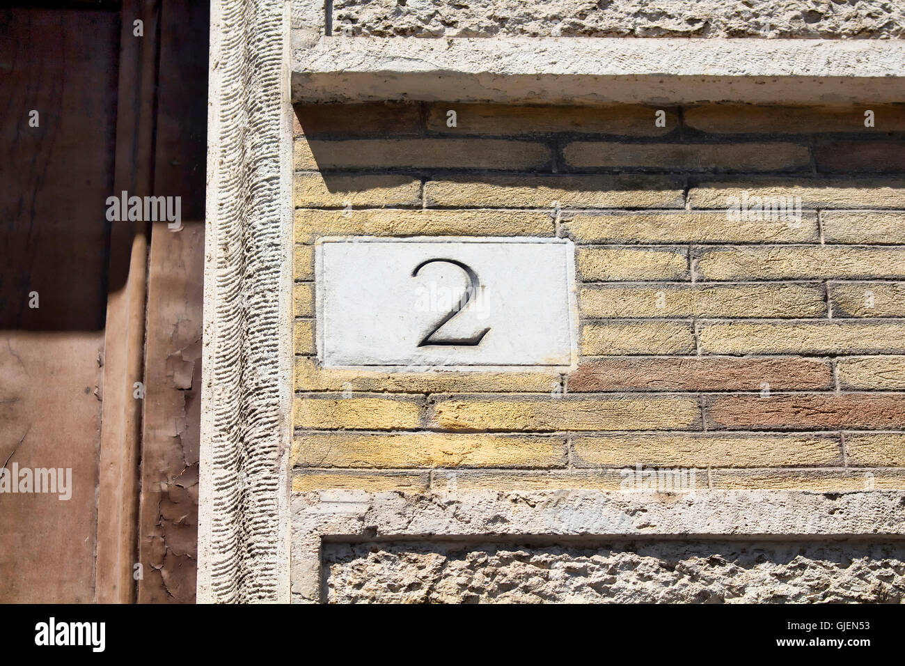 Engraved building number in Rome Stock Photo - Alamy