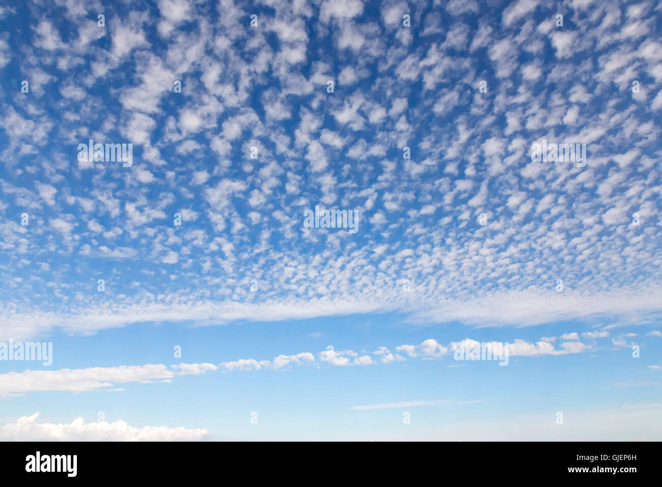 White fluffy clouds float on the blue sky in a clear sunny day Stock ...