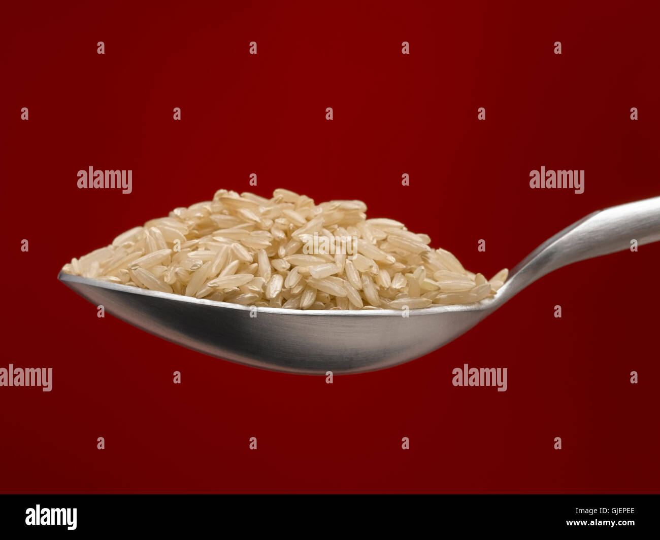 Brown rice pile hi-res stock photography and images - Alamy