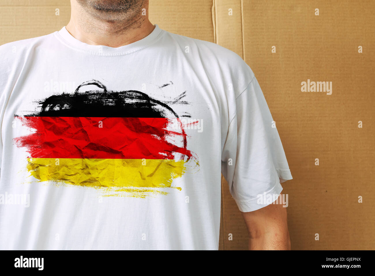 Man wearing white shirt with German flag print, adult male person ...