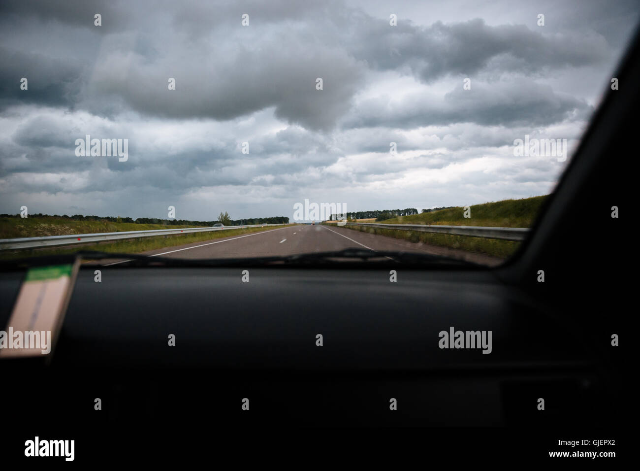 View from windshield of car driving on the road Stock Photo - Alamy