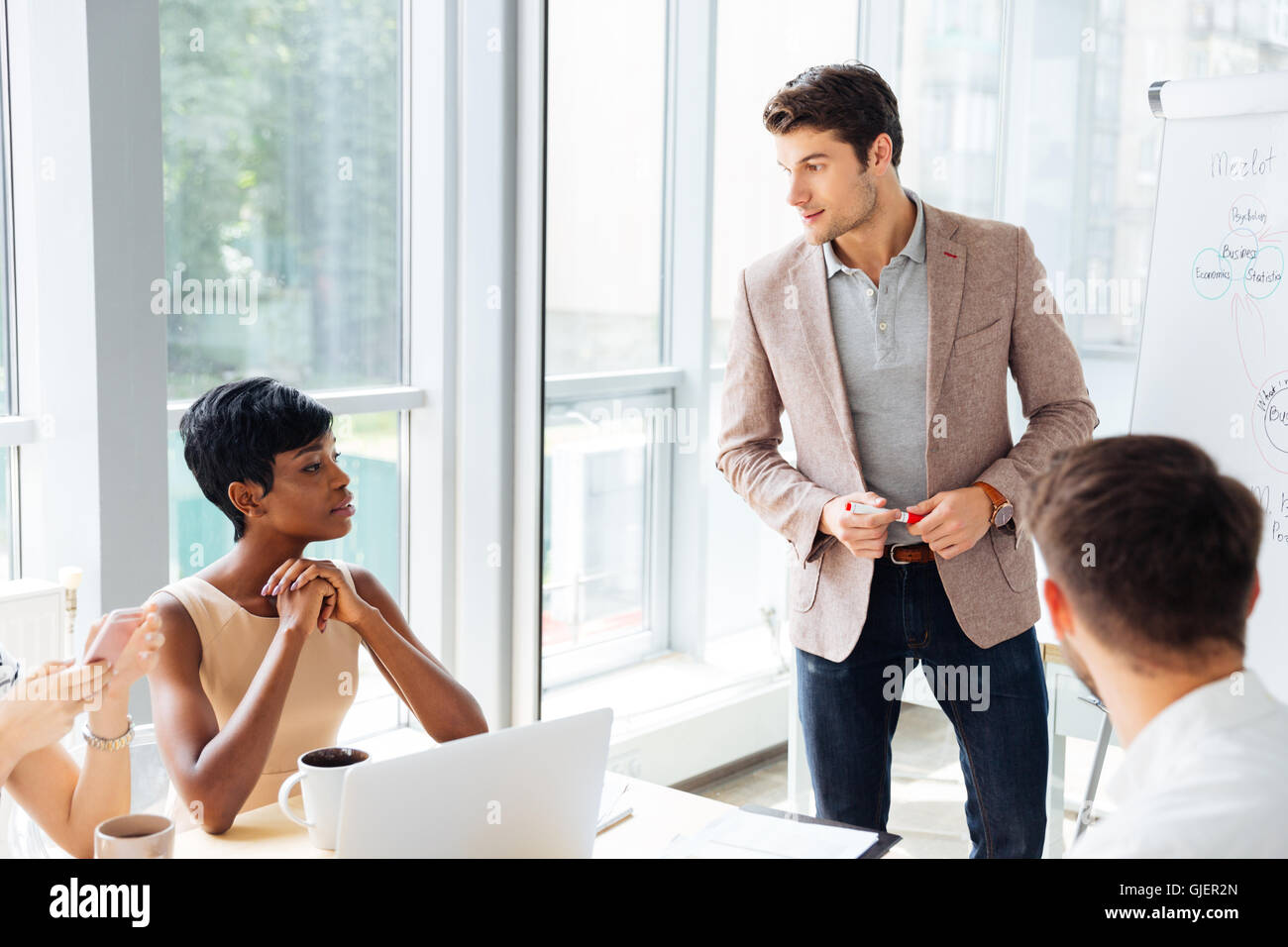 Businesspeople having a meeting at the office Stock Photo - Alamy