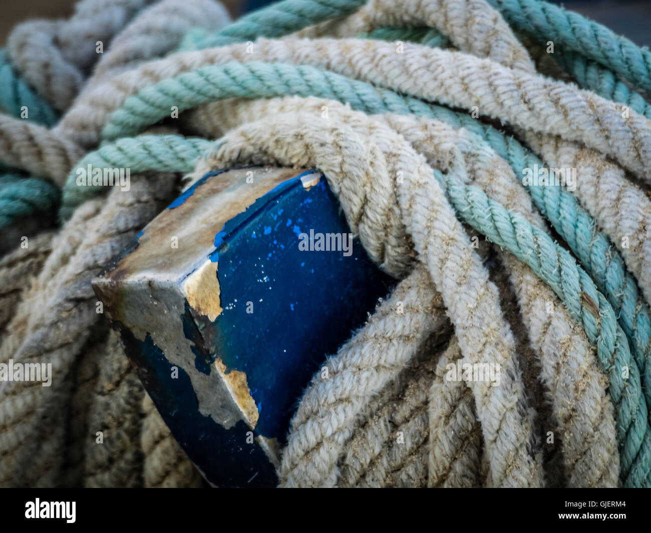 Bunch of different coloured fishing ropes in a harbour Stock Photo - Alamy