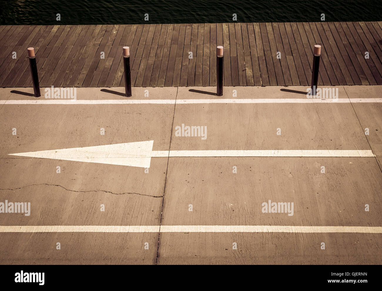 A picture of an arrows indicating the direction of traffic on the lane ...