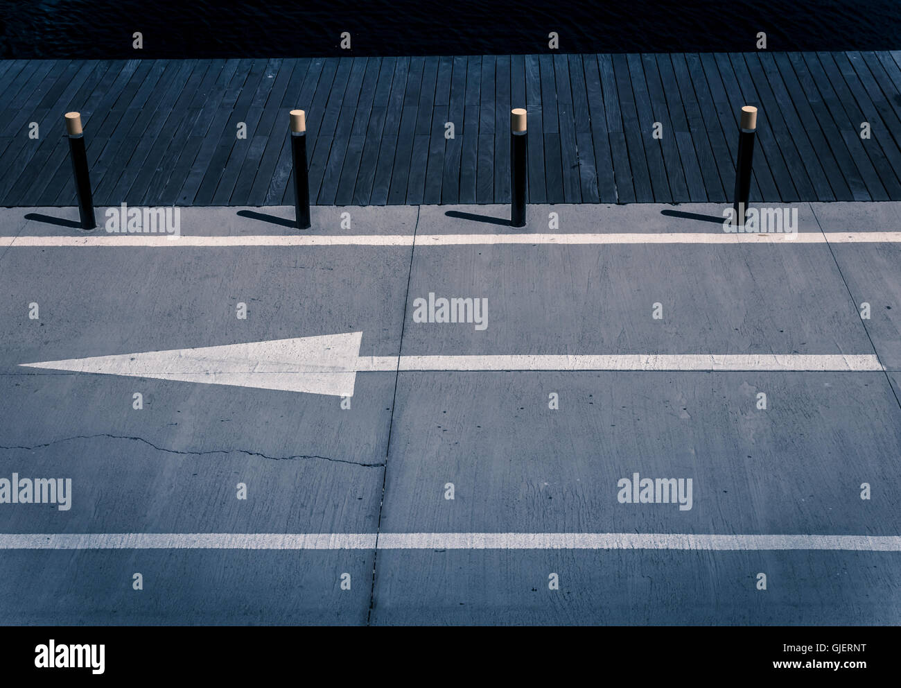 A picture of an arrows indicating the direction of traffic on the lane ...