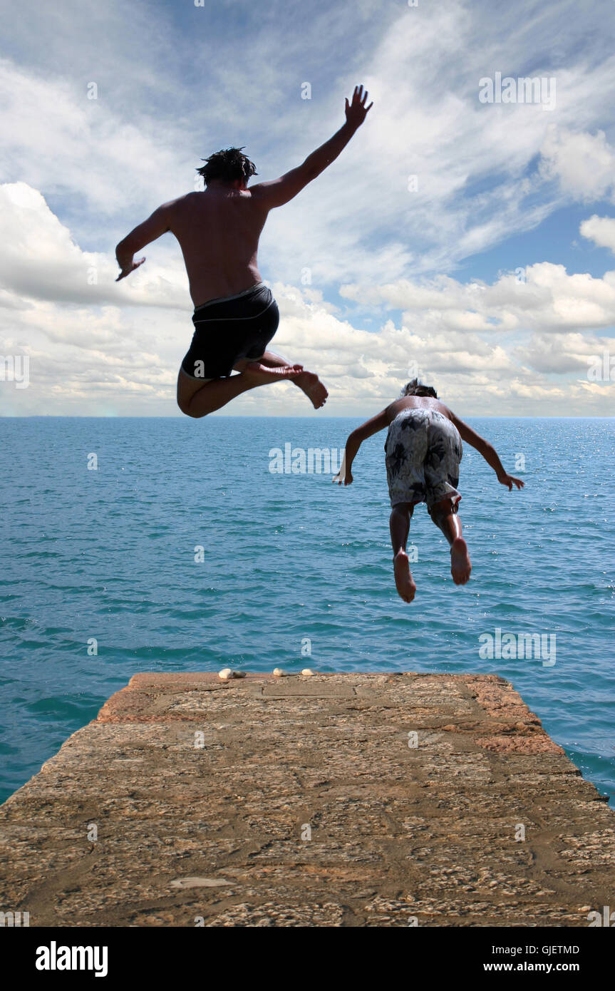 Boys jumping off bridge hi-res stock photography and images - Alamy
