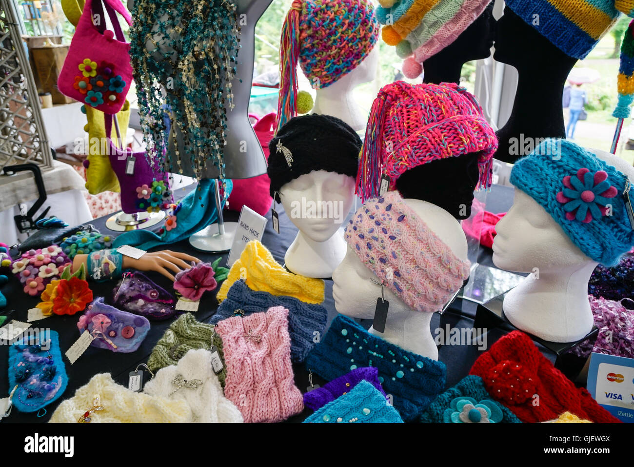 Market stall selling knitted hats and head wear Derbyshire England ...