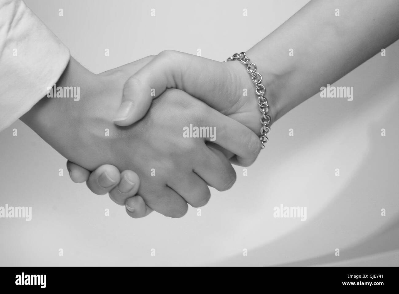 Farewell greeting handshake shake hands Black and White Stock Photos ...