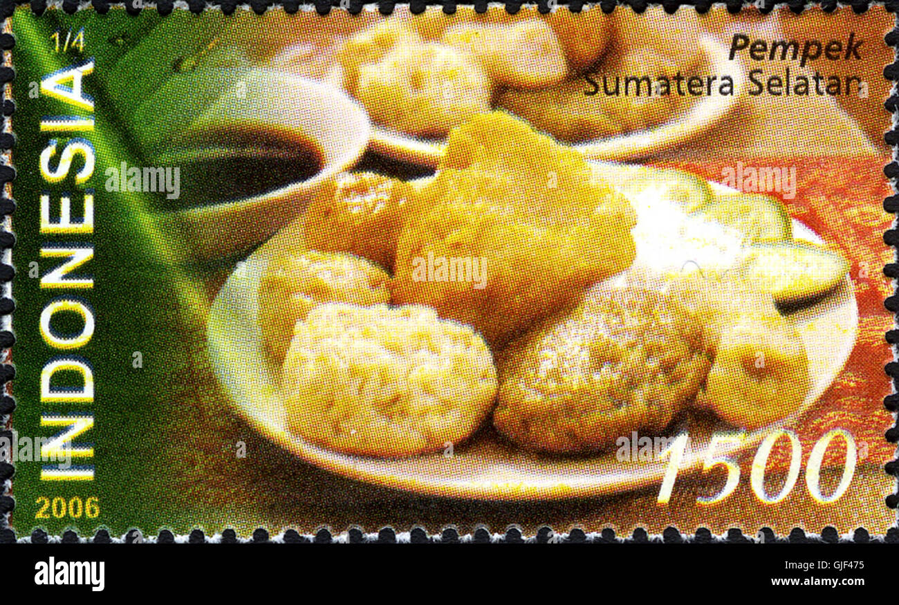 A set of Indonesian stamps numbered 046-06, featuring various cultural ...