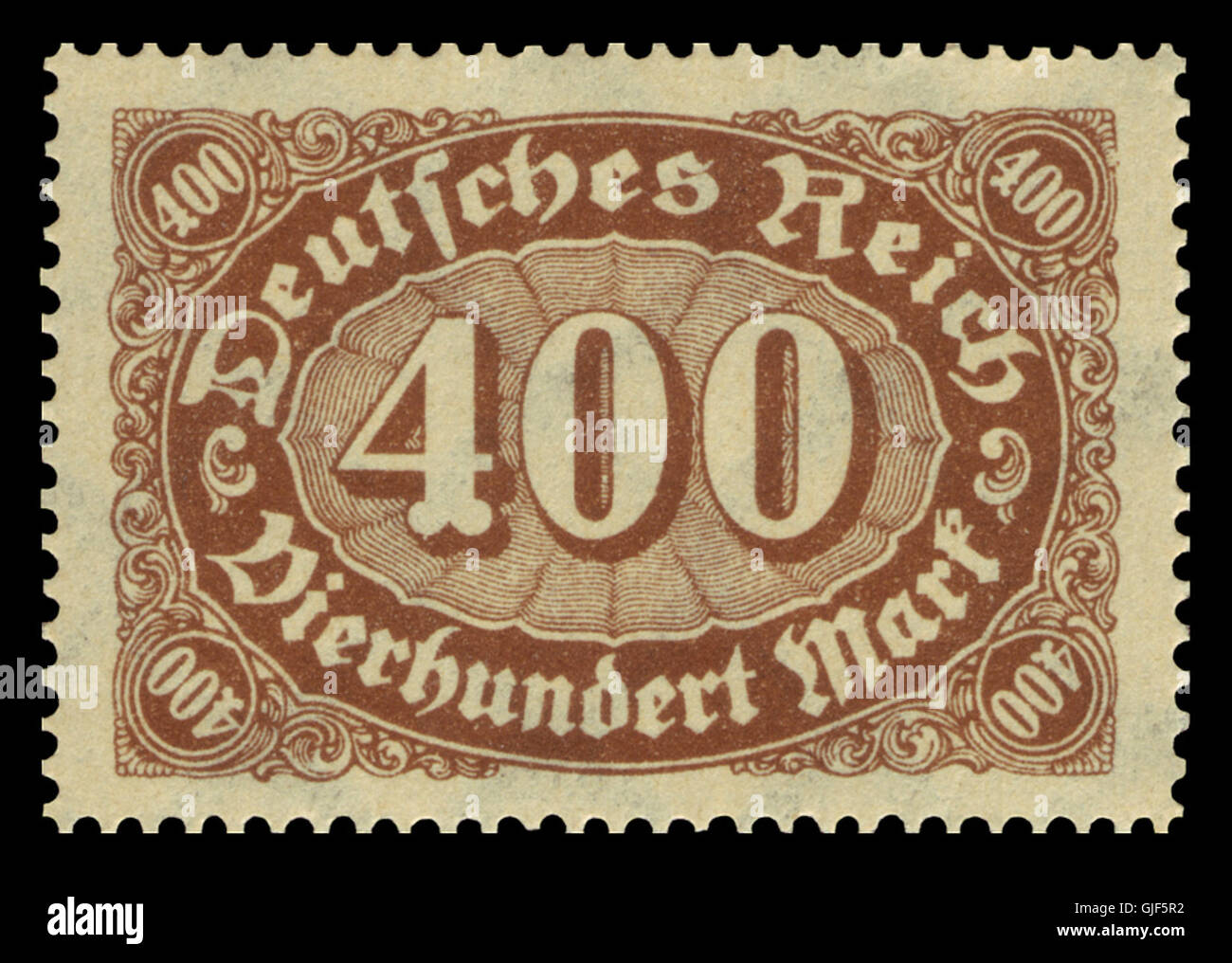 This 1922 German stamp features the 'Ziffern im Queroval' design, a ...