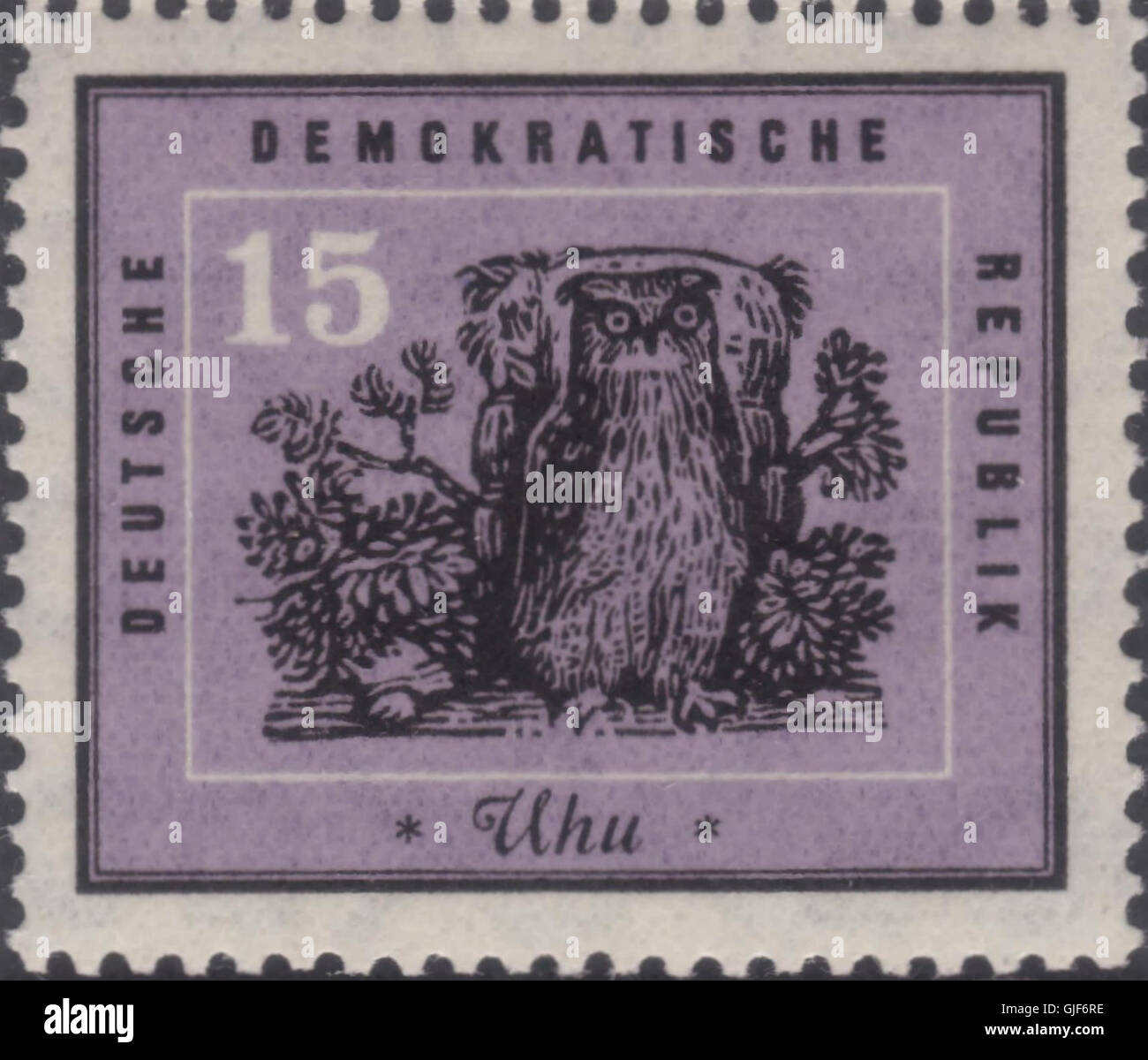The DDR 1959 Michel 700 Uhu stamp features the Eurasian eagle owl (Uhu ...