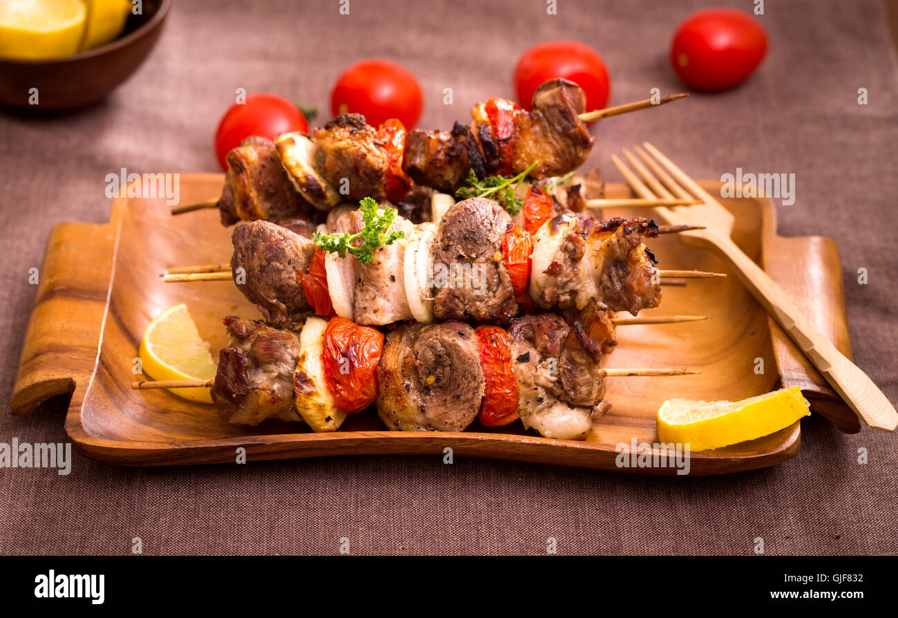 Barbecue meat on skewers Stock Photo - Alamy