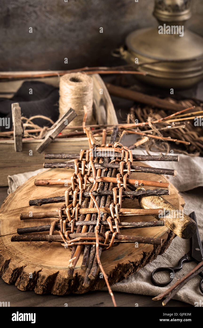 Basket weaving items on table Stock Photo - Alamy