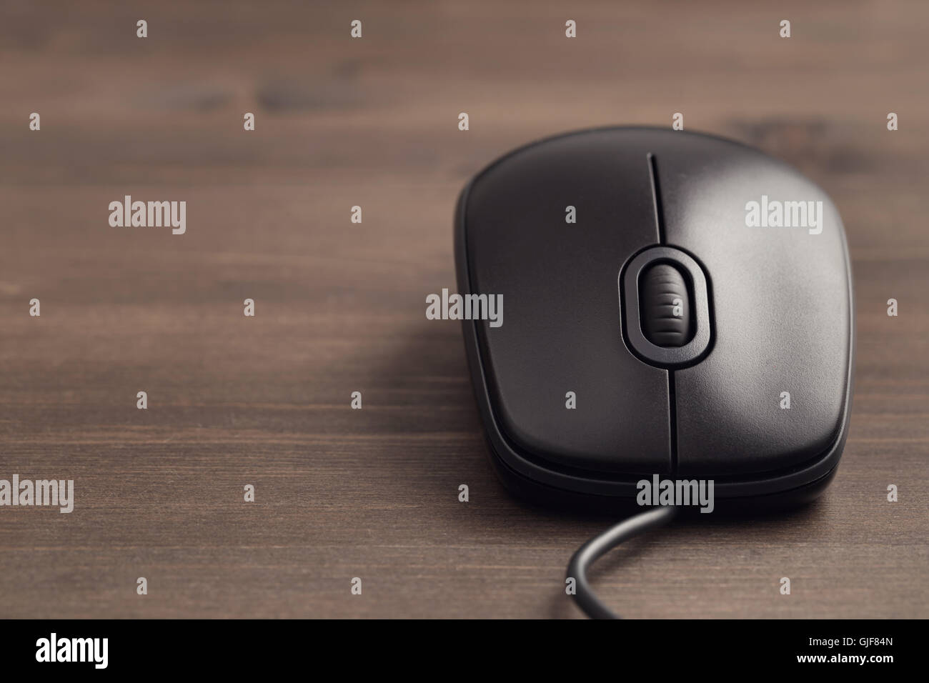 Black computer mouse closeup Stock Photo - Alamy