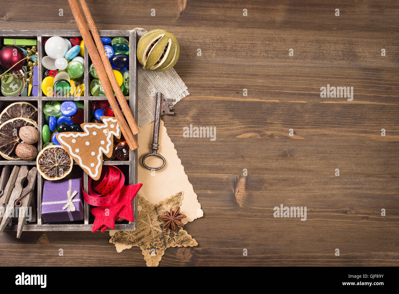 Box of different handcraft items from left side wooden table Stock ...